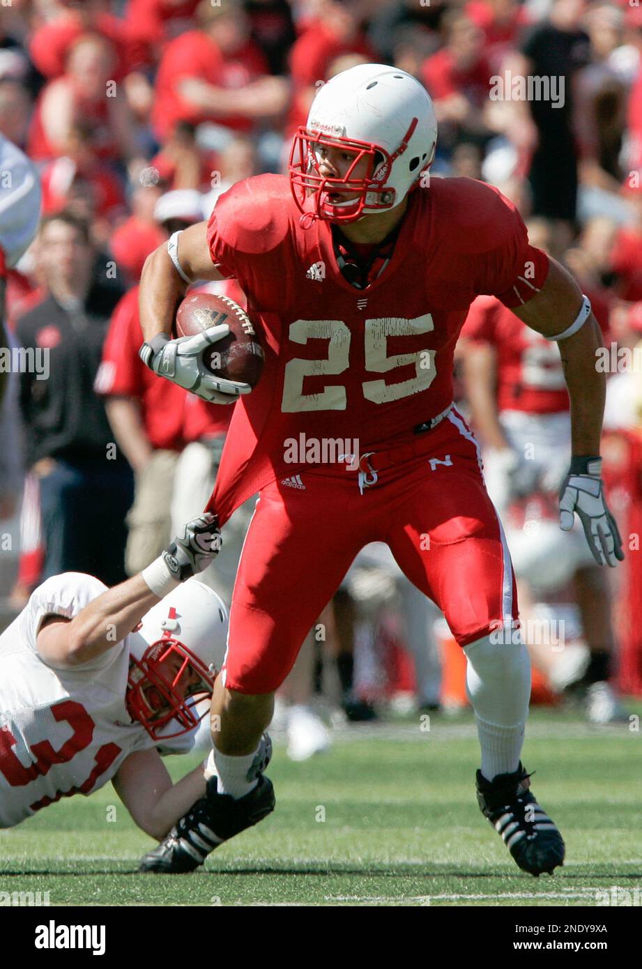 White team's Jase Dean (31) hangs onto Red team's Kyler Reed, during ...