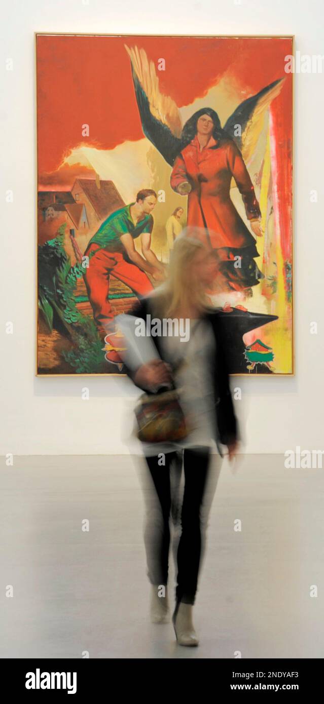 In this picture taken April 15, 2010 a woman walks in front of Neo ...