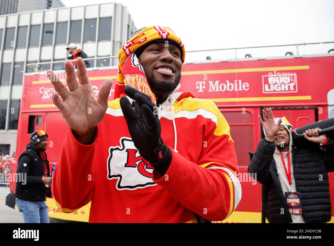 Kansas City Chiefs defensive end Carlos Dunlap dances as he walks in a ...