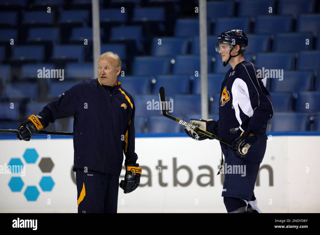 Buffalo Sabres coach Lindy Ruff talks to Tyler Myers during hockey ...