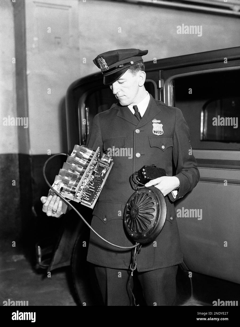 Police department officials from New York broadcast test messages to a ...