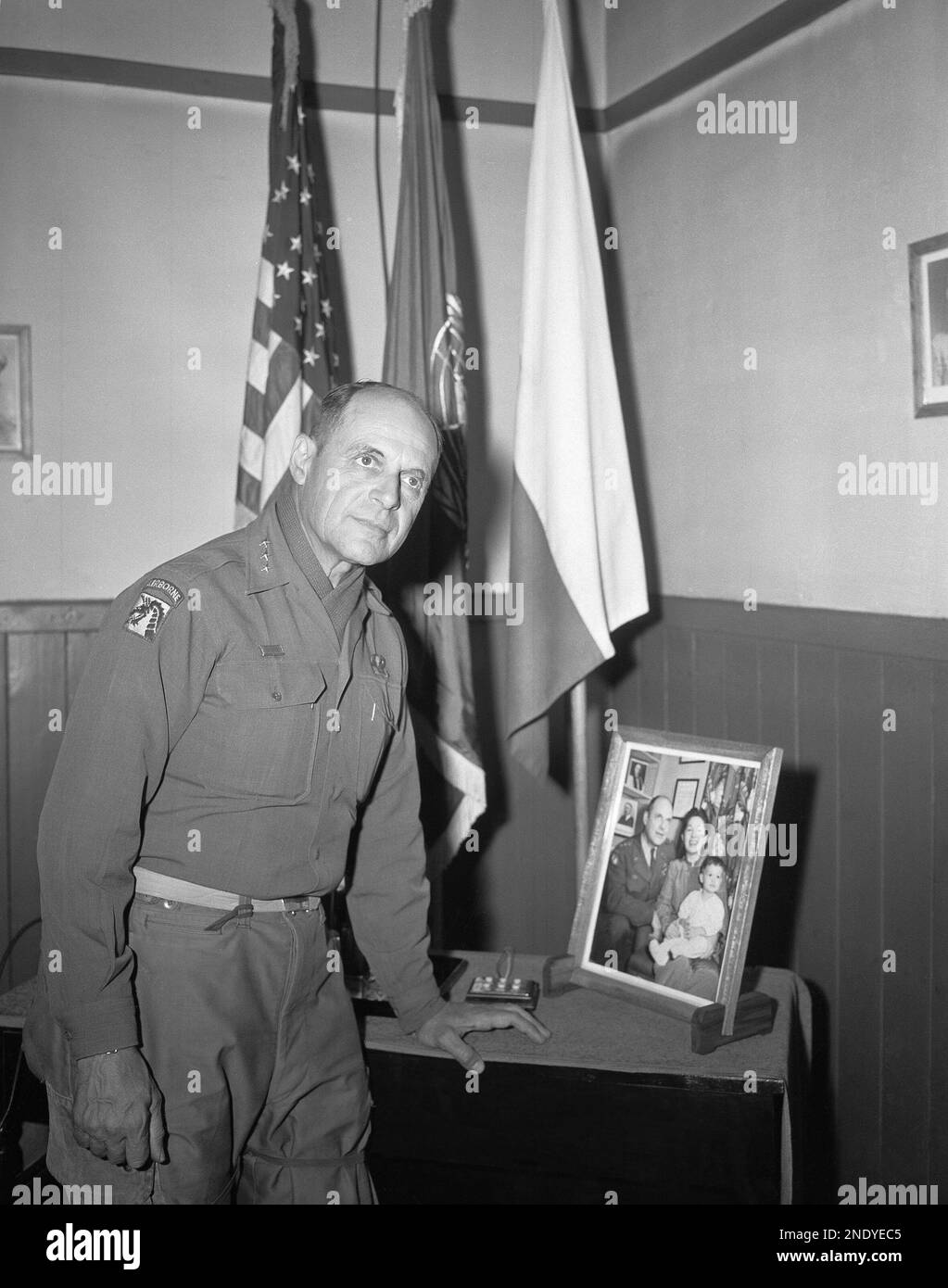 Lieut. Gen. Matthew B. Ridgway takes a final look at a photograph of ...