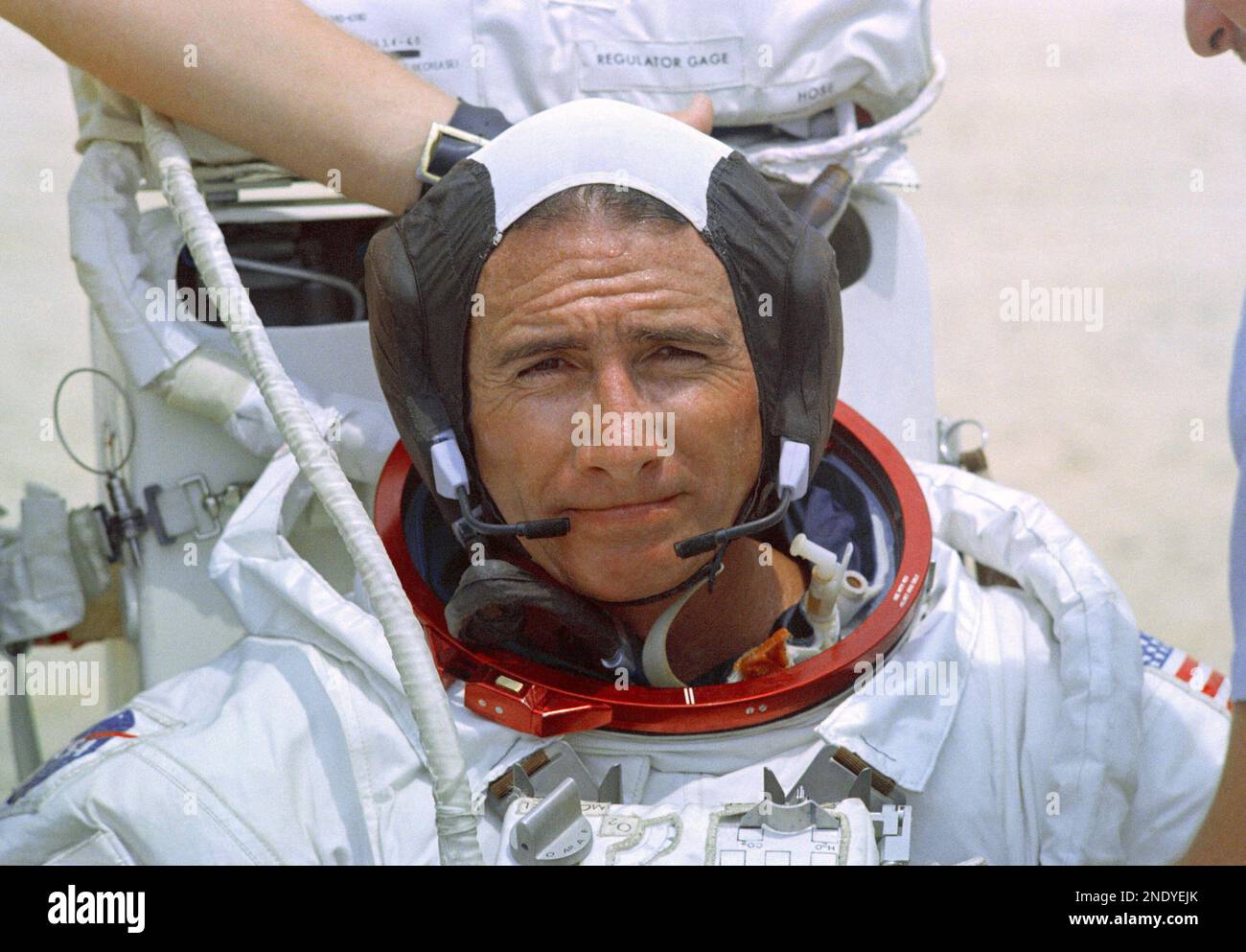 James R. Irwin, Apollo 15 astronaut, gets suited up for start of EVA (extra-vehicular activity ...