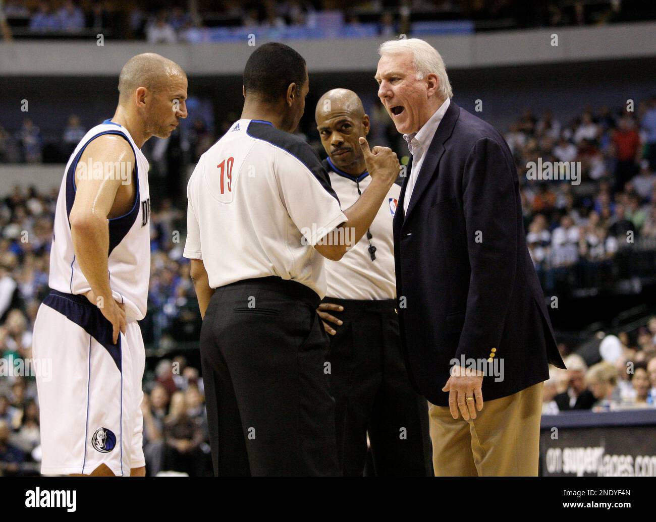 Dallas Mavericks' Jason Kidd, from left, official James Capdrs ...