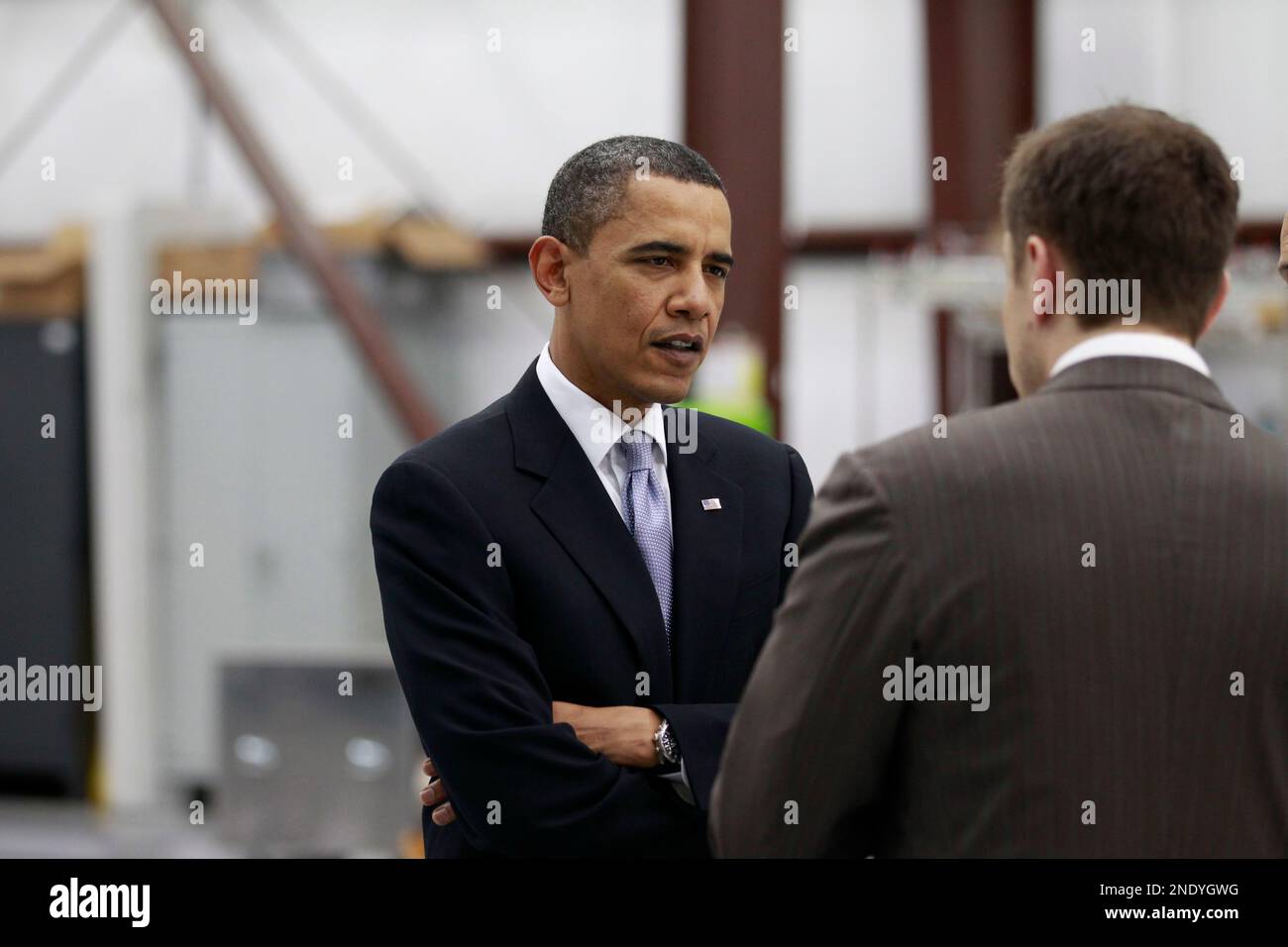 President Barack Obama talks with SpaceX CEO Elon Musk at Kennedy Space ...