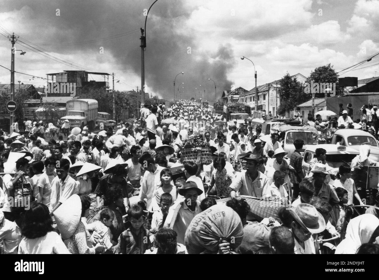 Smoke rises from the southwestern part of Saigon on May 7, 1968 as ...