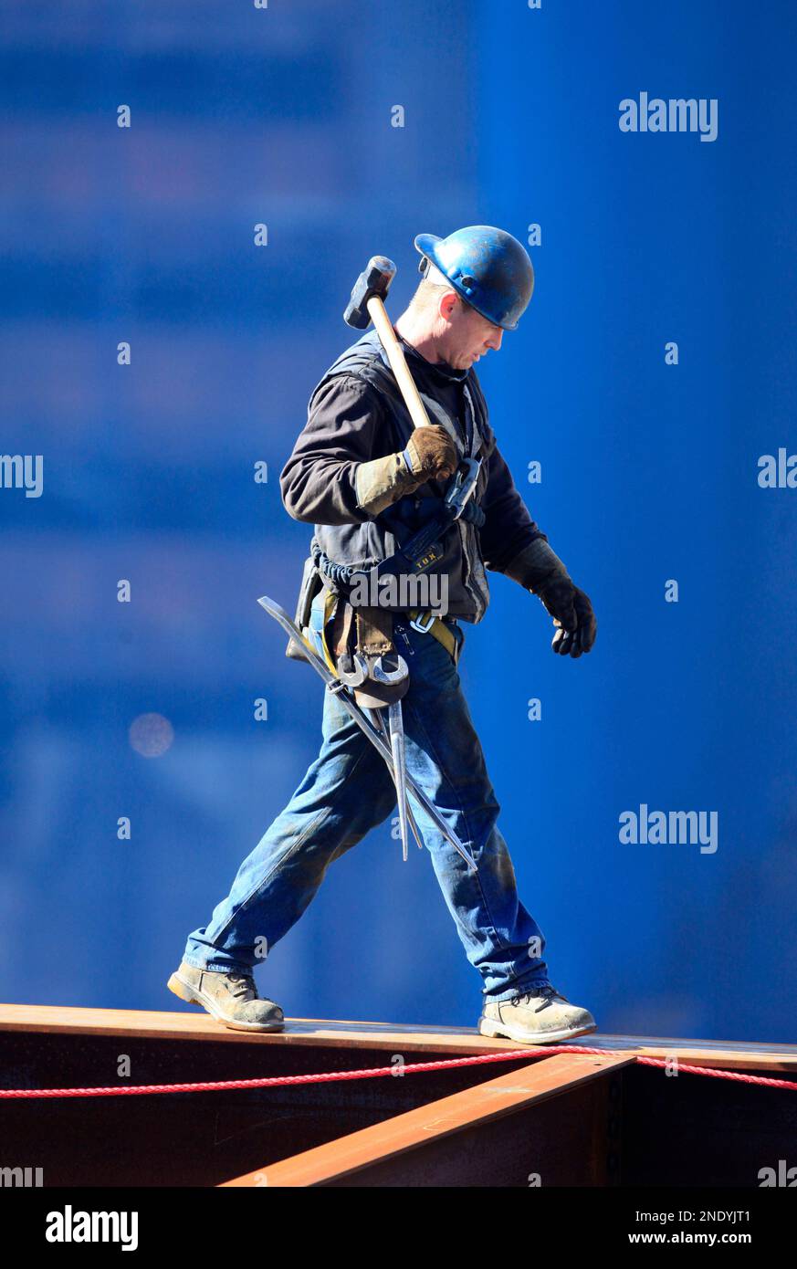 An ironworker walks a steel beam at One World Trade Center, Thursday ...