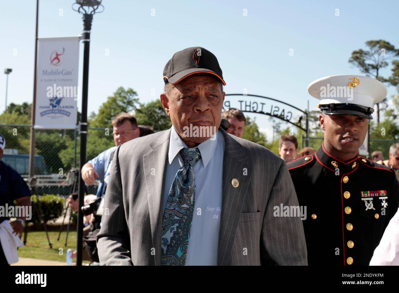 Hall of Famer Willie Mays is escorted to the front porch for dedication ceremonies of the Hank ...