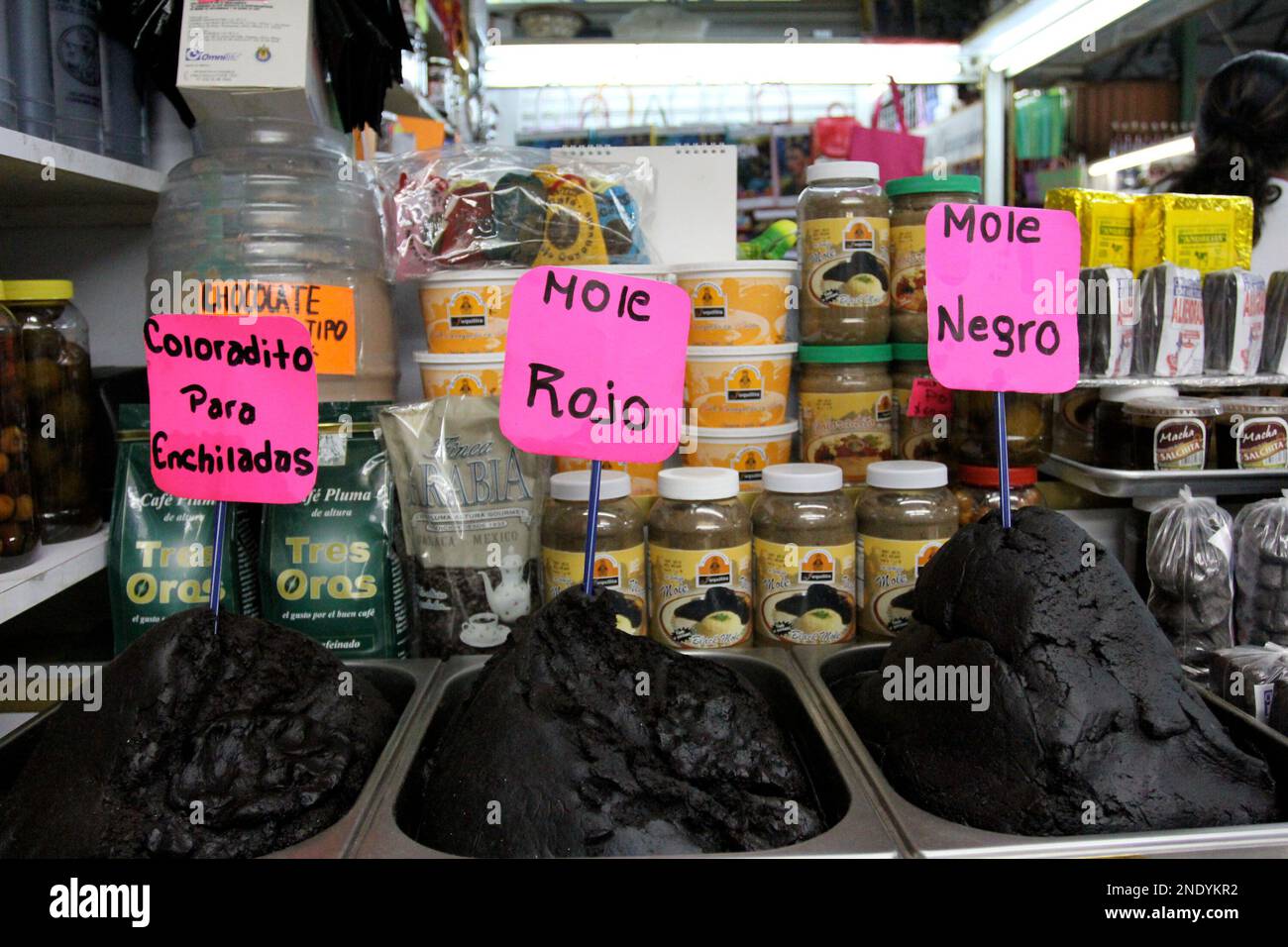 A vendor at the Benito Juarez Market in Oaxaca City, Oaxaca shows off ...