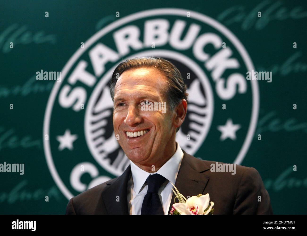 Starbucks Corp. CEO Howard Schultz smiles during a ceremony marking the ...