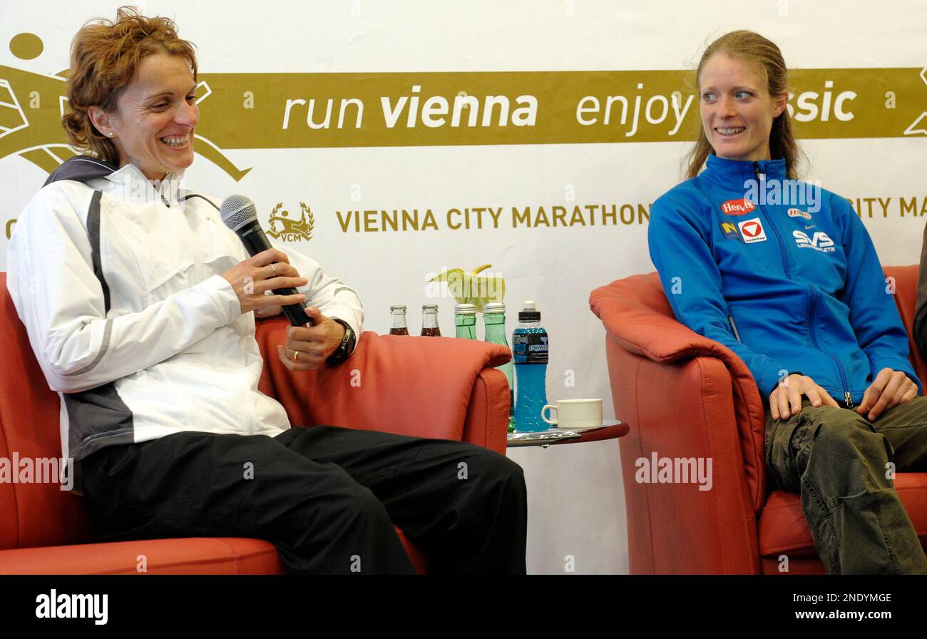 Marathon runners Luminita Talpos of Romania, left, and Andrea Mayer of ...