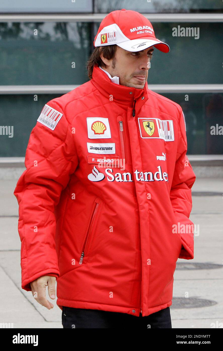 Ferrari Formula One driver Fernando Alonso of Spain arrives at the ...
