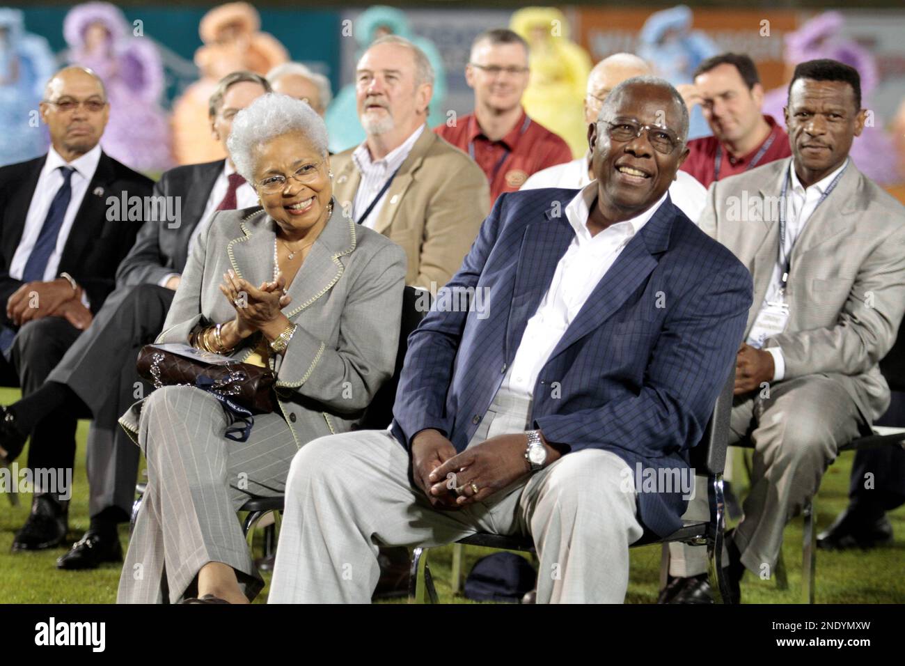 Hank Aaron with his wife Billye at his side listens to presentations and introductions during ...