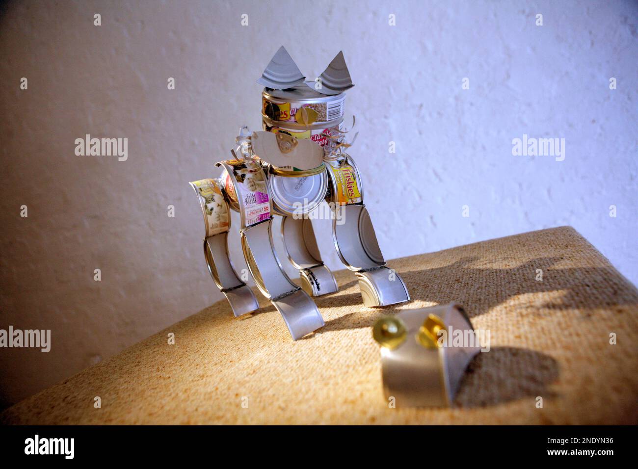 A collection of "can-structions," art pieces made from parts of used ...