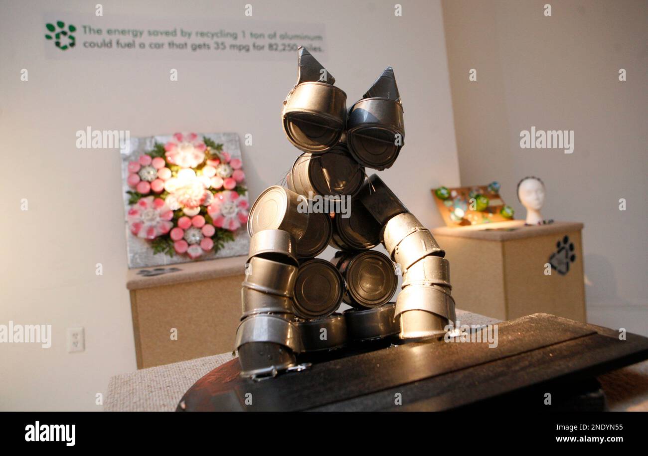 A collection of "can-structions," art pieces made from parts of used ...