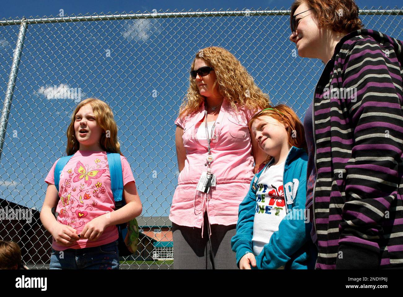 Third-grader Elizabeth Heisler, left, stands near her mother, Andrea ...