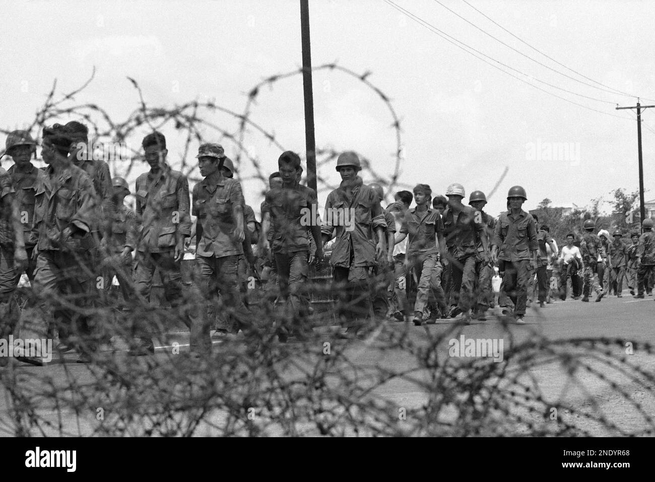 South Vietnamese troops and civilians retreat along Route 15 east of ...