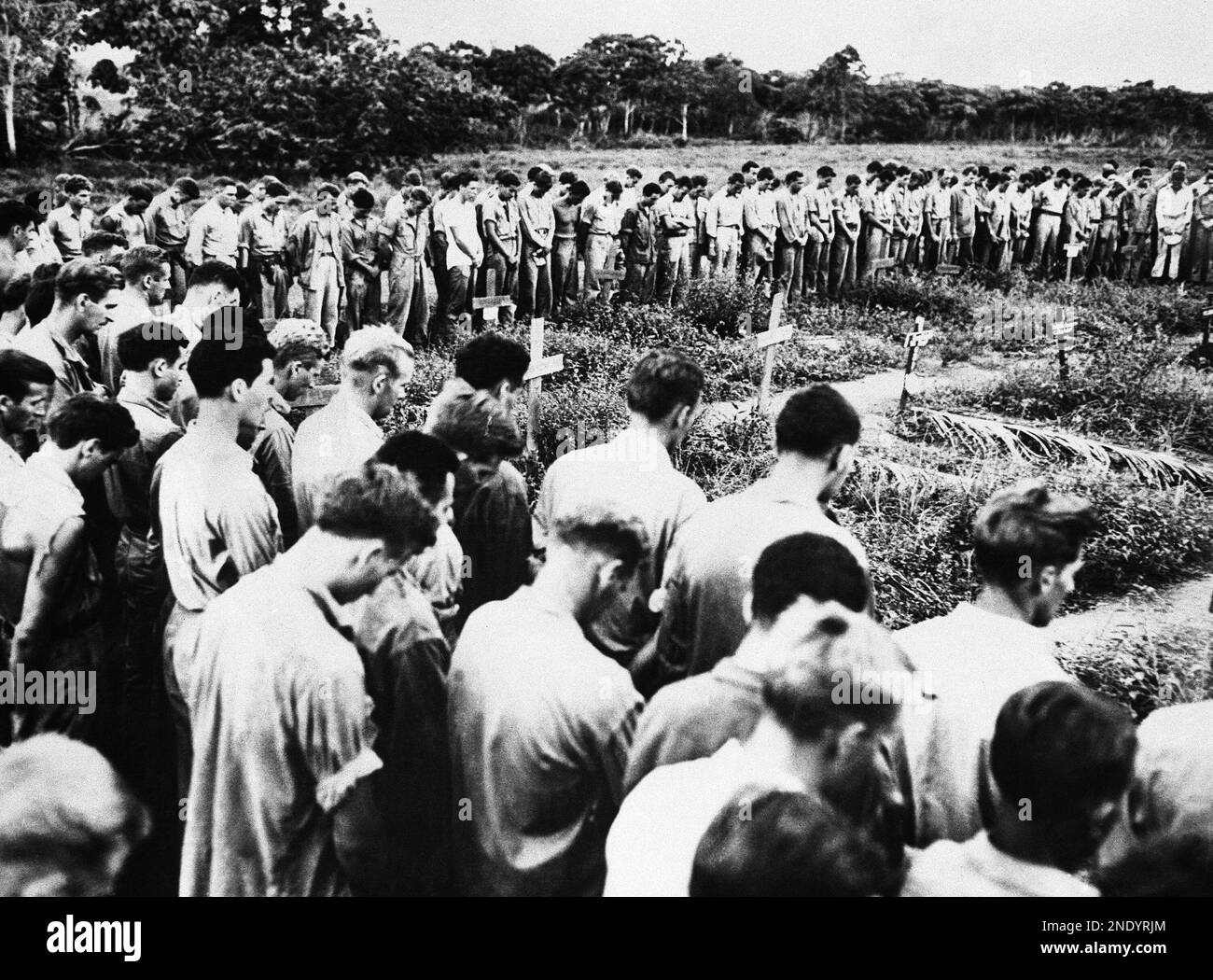 American troops who took part in fighting on Guadalcanal stand with ...