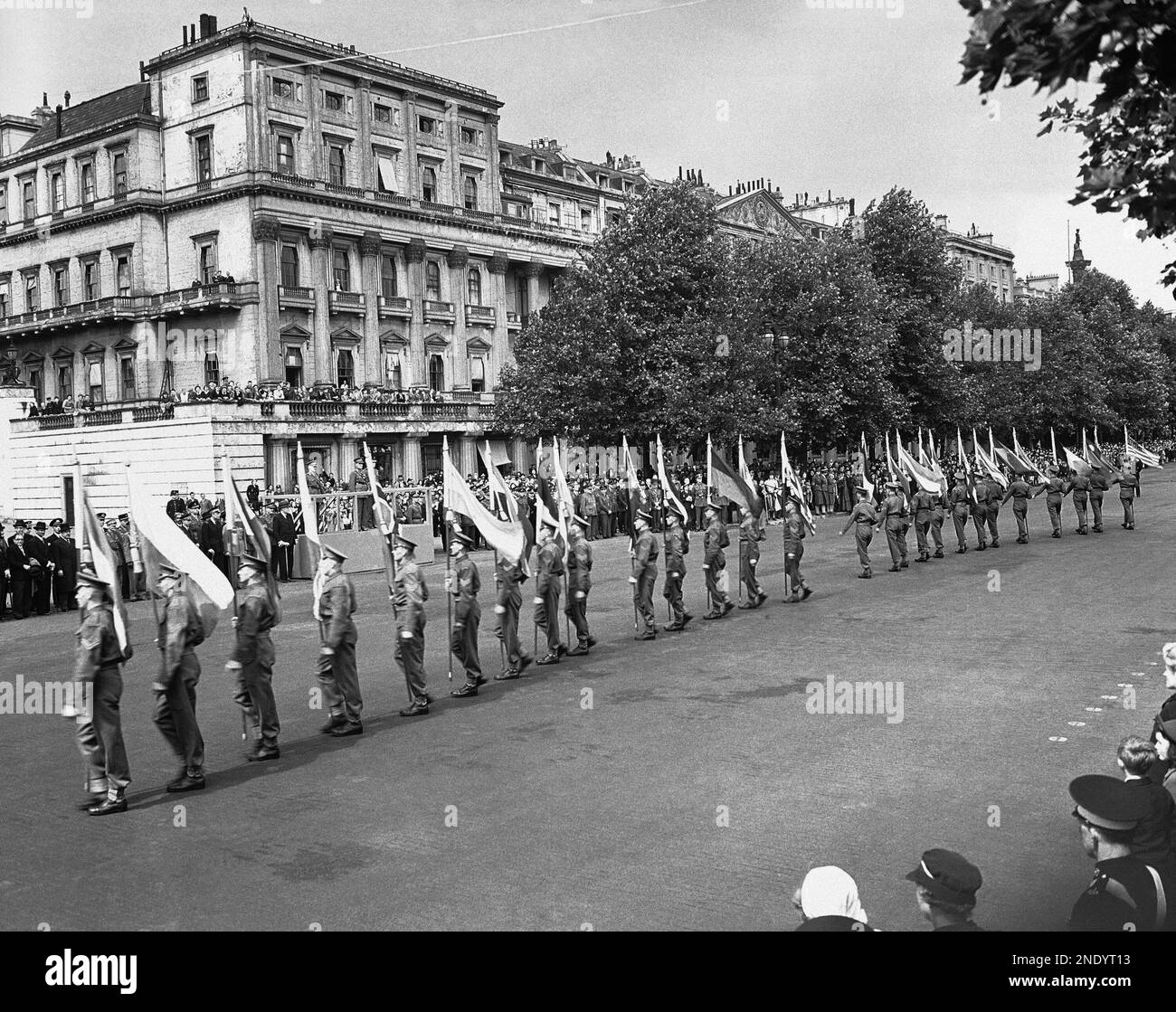 Flag-bearers, carrying flags of twenty-seven nations prepare are to ...