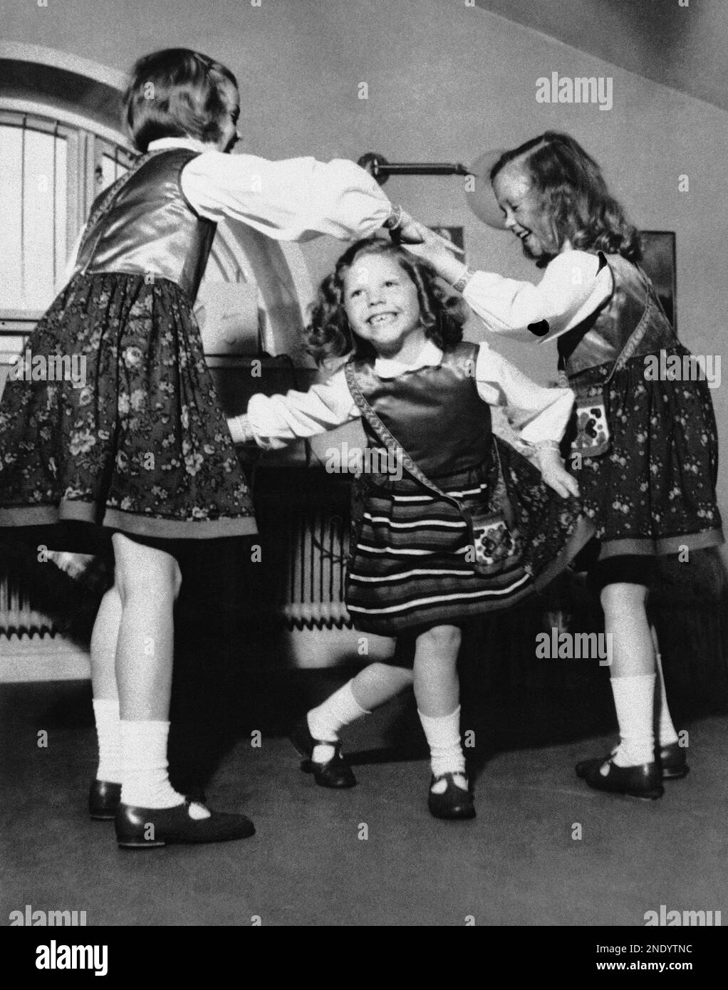 Three little Swedish Princesses, dressed in colourful native costumes ...