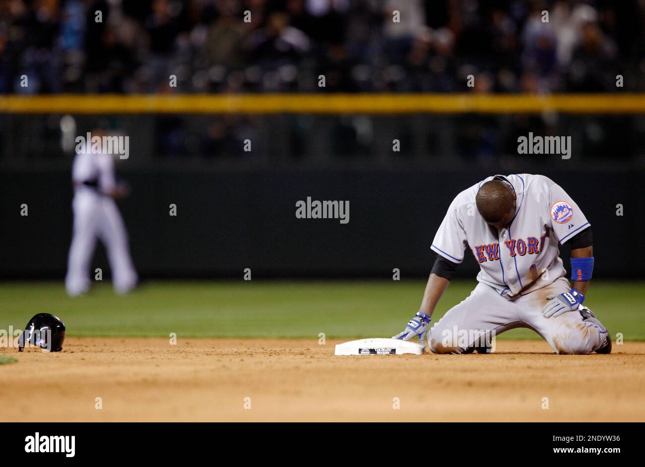 New York Mets' Luis Castillo reacts after being put out at second base ...