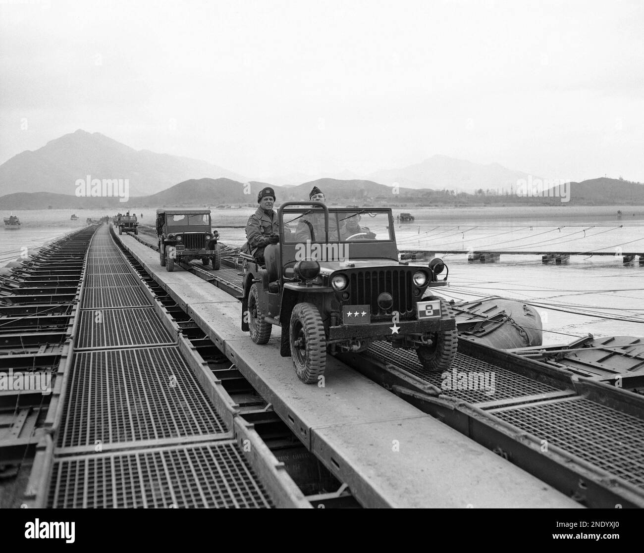 Lt.Gen. Matthew B. Ridgway crosses the pontoon bridge spanning the Han ...