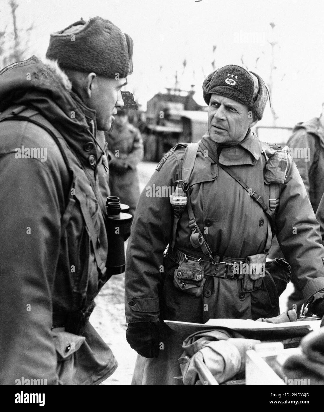 Lt. General Matthew B. Ridgway, commanding general, 8th army talks with ...
