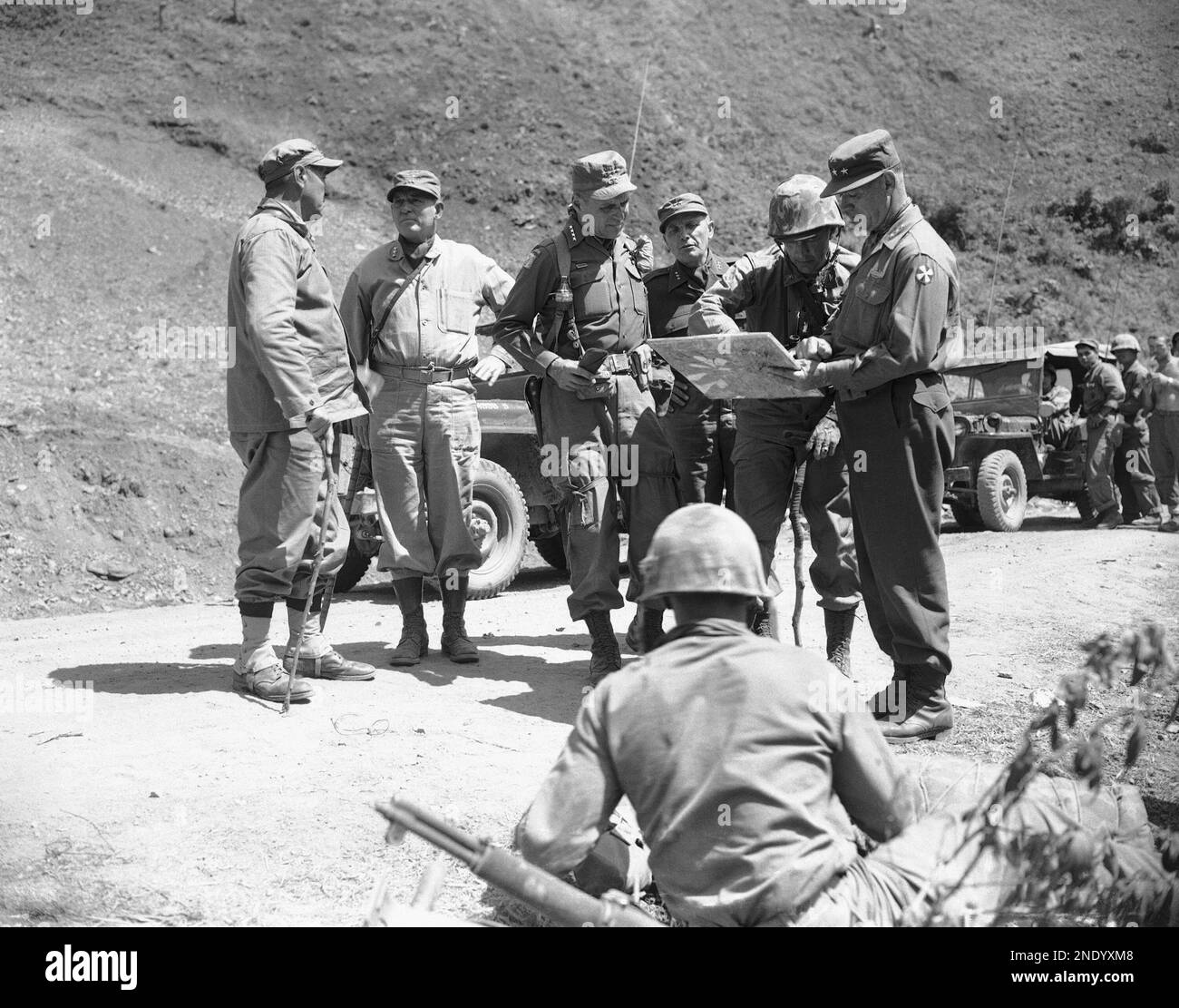 Battle plans are the focal point of this front line conference among ...