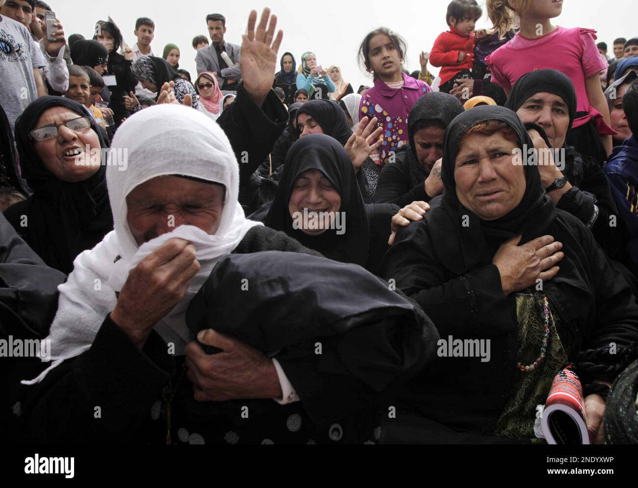 Women grieve for their relatives, some of the 107 Kurdish prisoners who ...