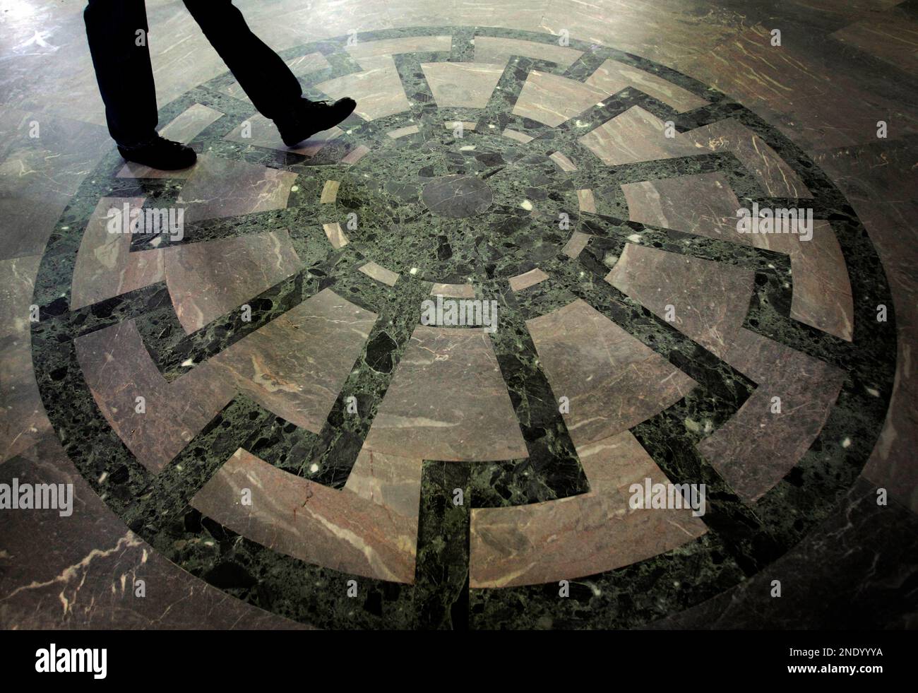 A symbol called the black sun is seen during an exhibition on the Nazi ...