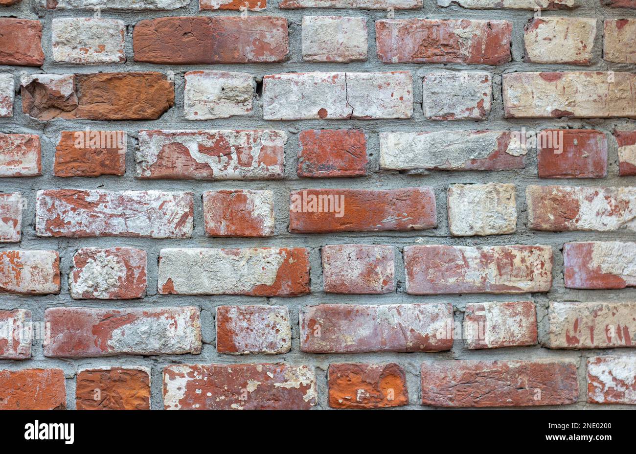brick background,fragment of brick wall of an old building beginning to ...