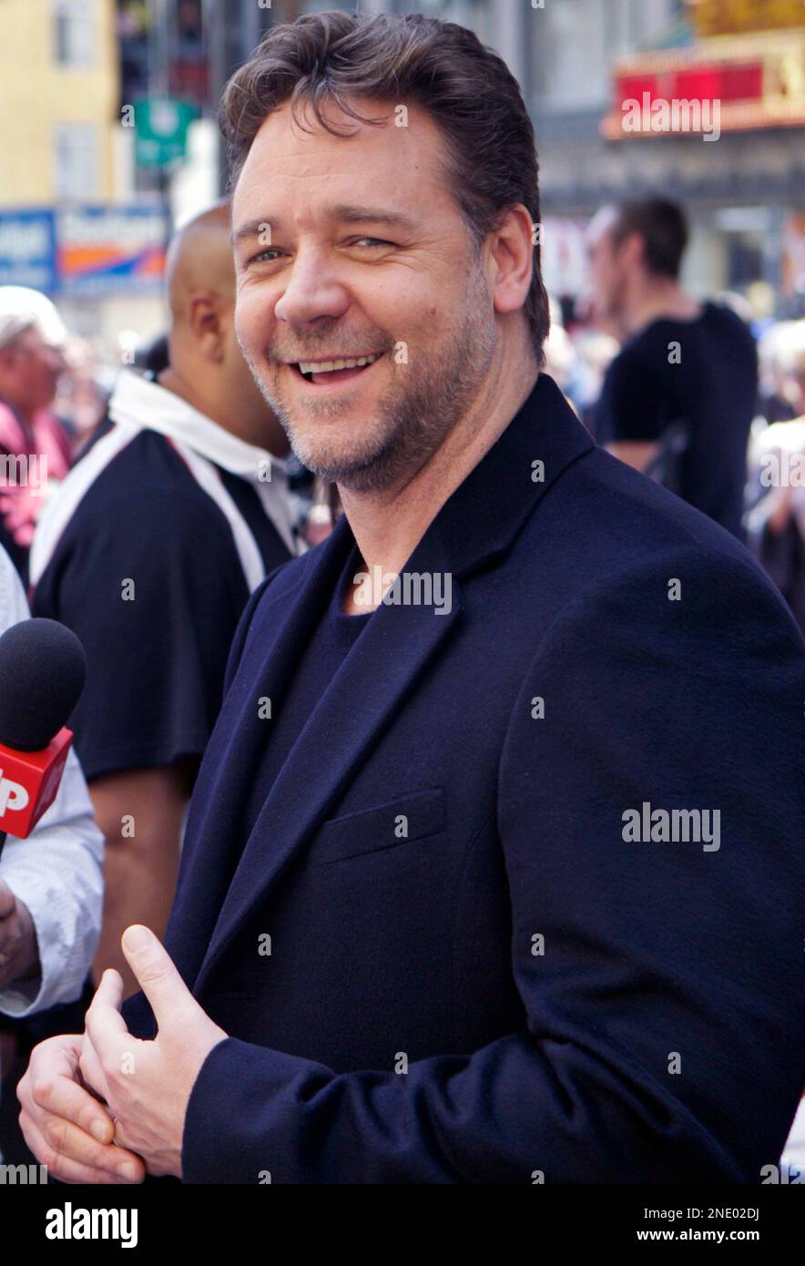 Academy Award actor Russell Crowe smiles as he is interviewed, after ...