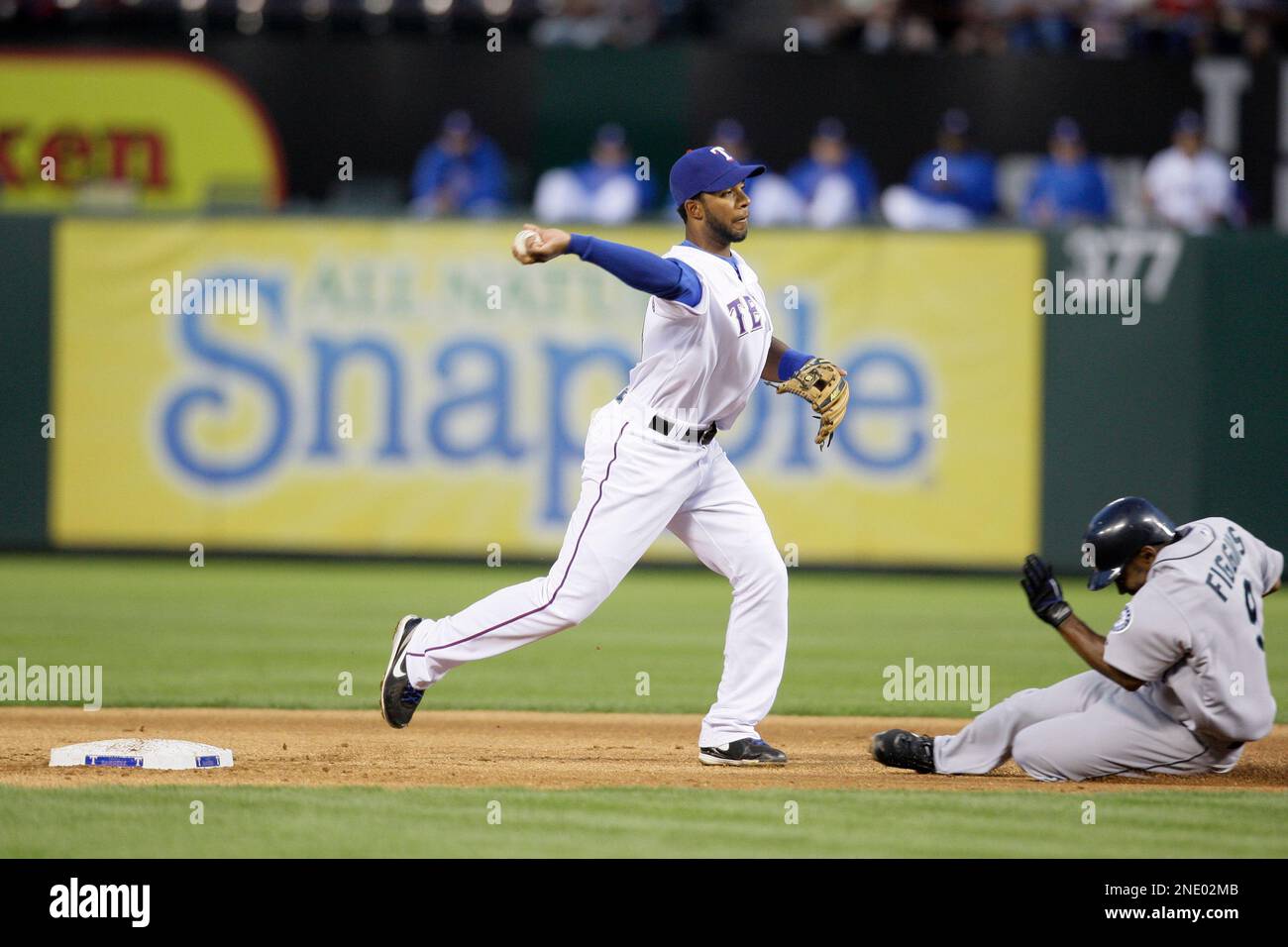 Texas Rangers' Elvis Andrus, left, and Seattle Mariners' Chone Figgins ...