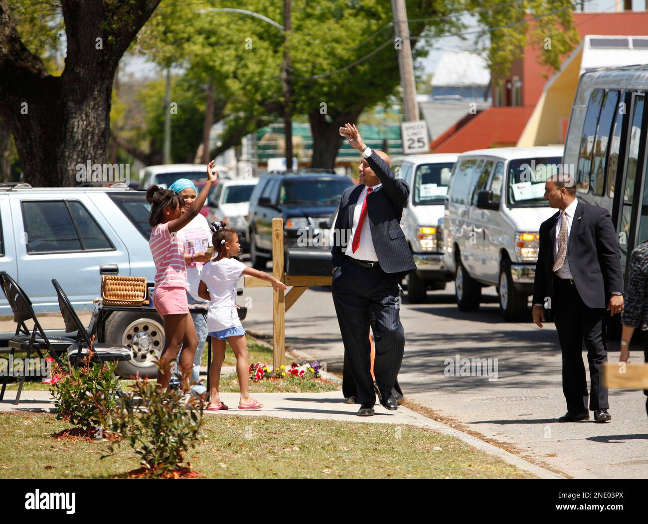 New Orleans Mayor Ray Nagin waves to residents and children selling ...