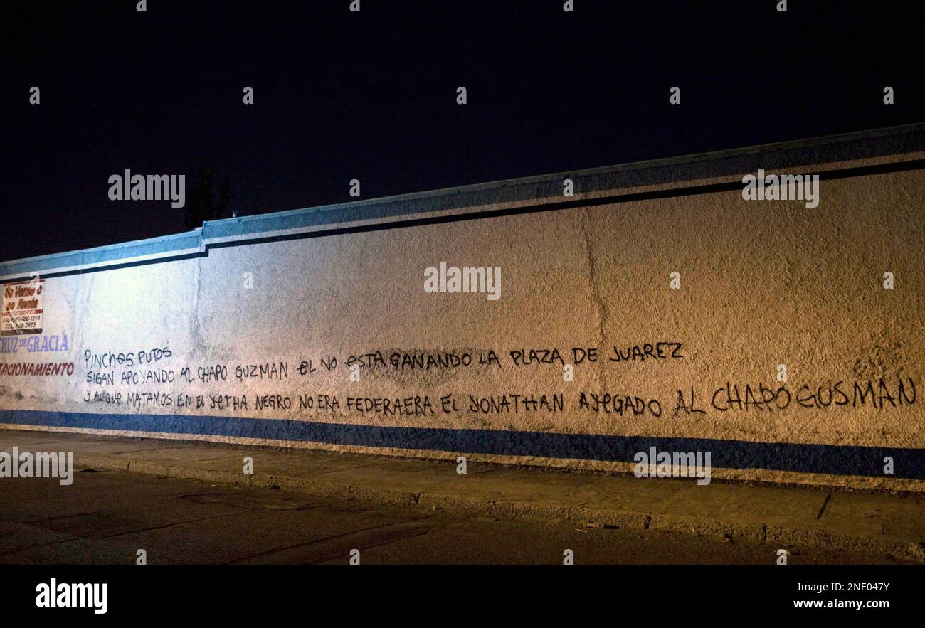 Graffiti, allegedly signed by members of the Juarez drug cartel, is ...