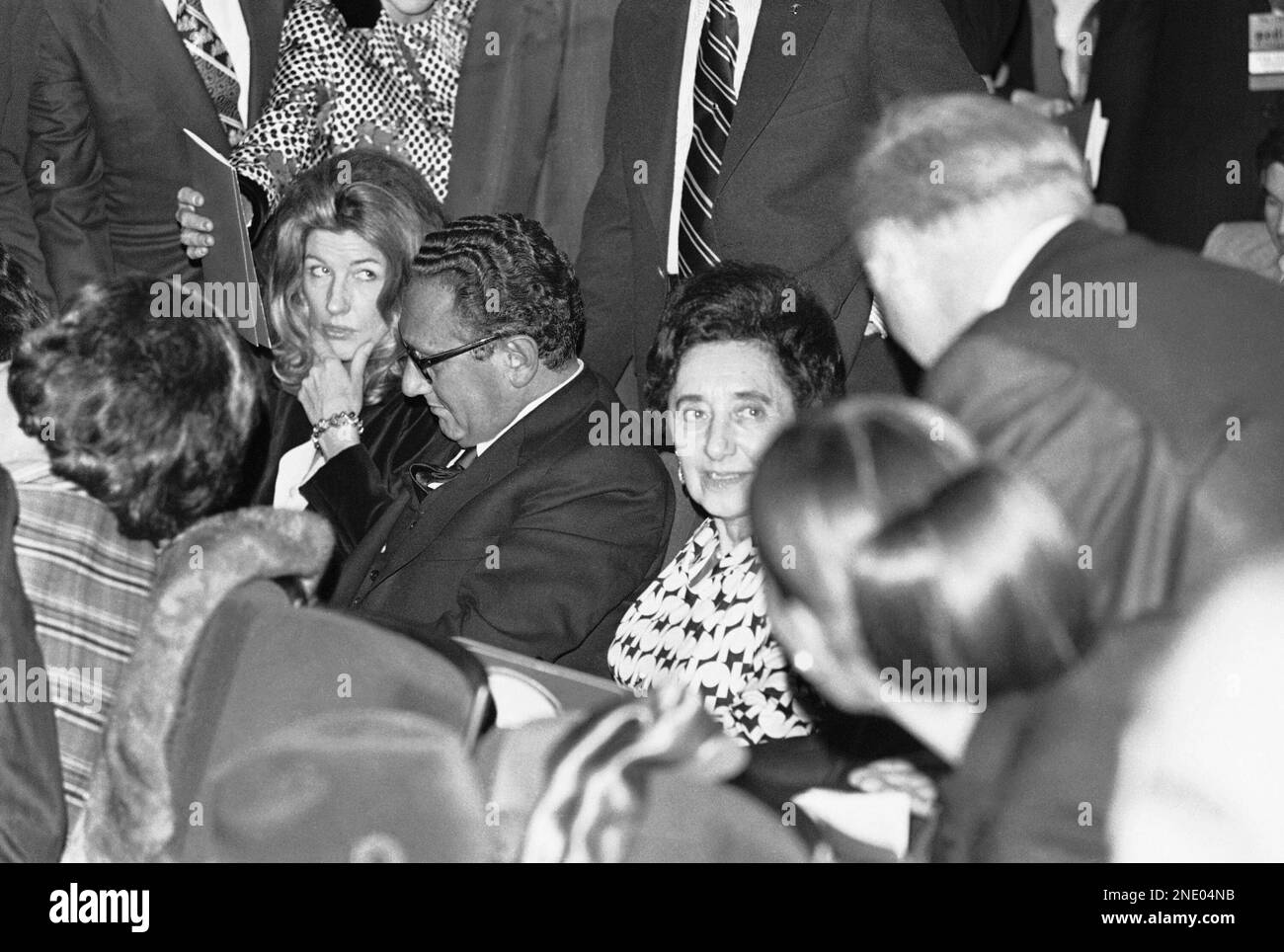 Nancy Maginnes, companion of Henry Kissinger glances at the ...