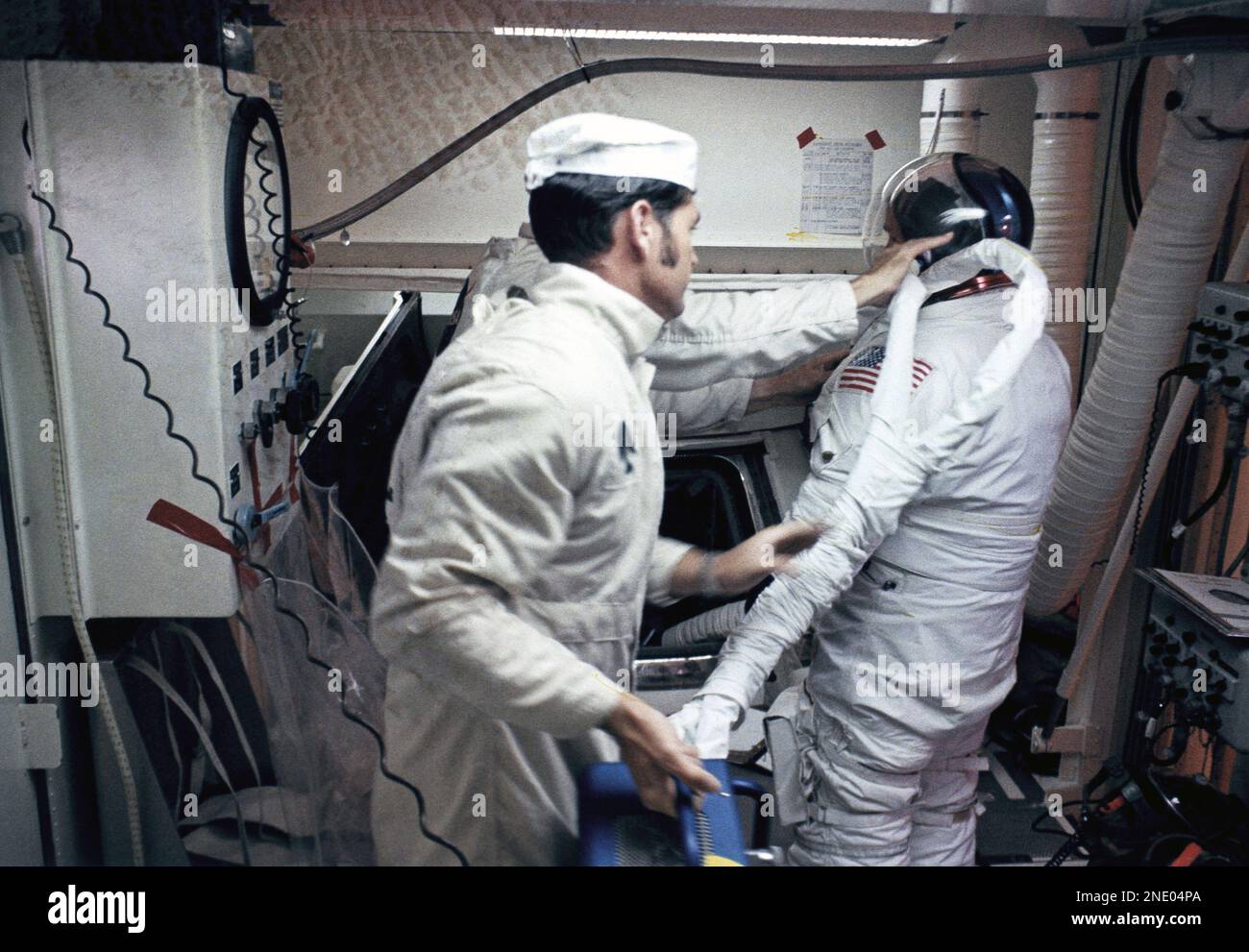 An Apollo 15 astronaut prepares to enter the spacecraft that later ...