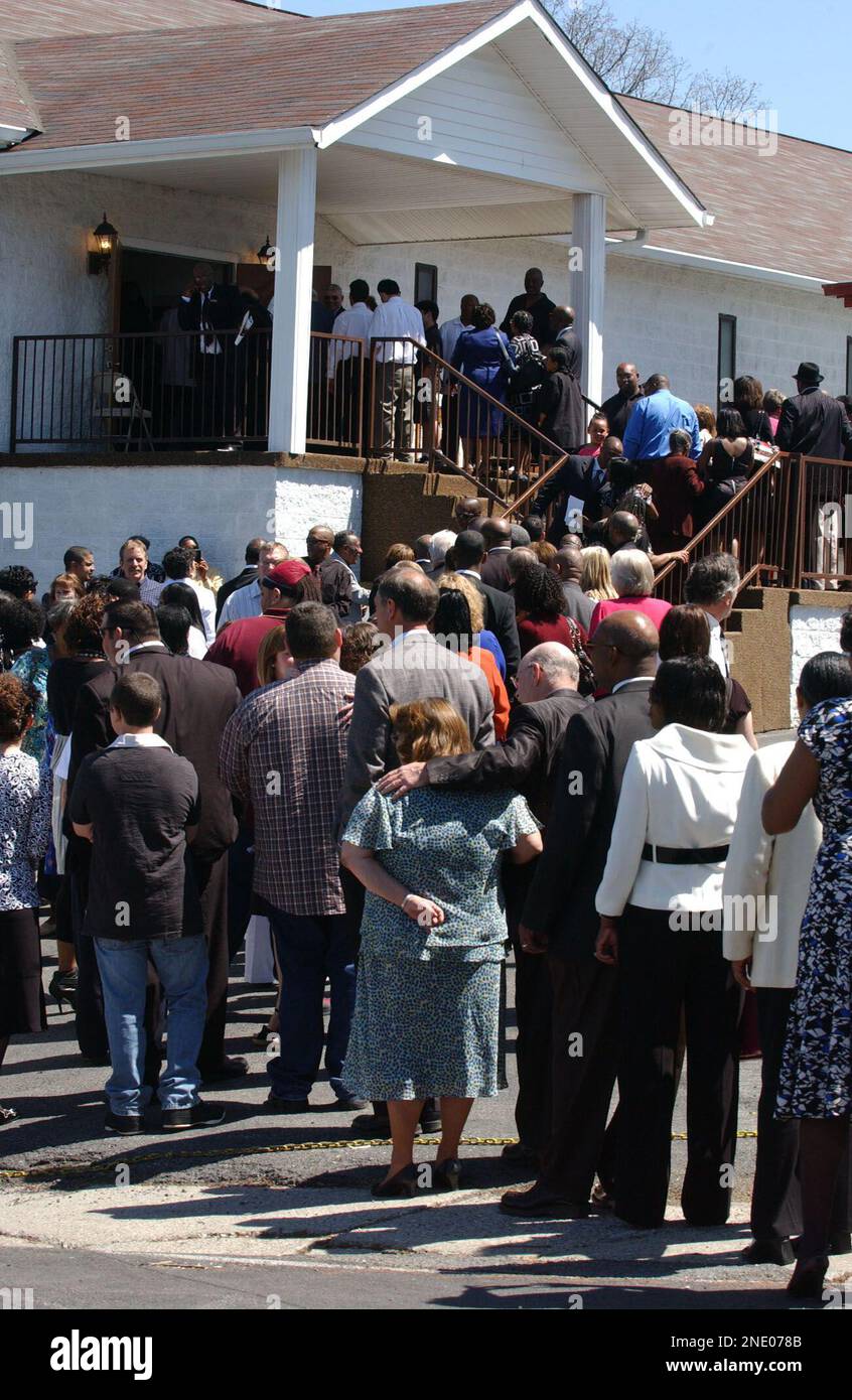 Friends and family stand in line at the funeral of William Roosevelt ...