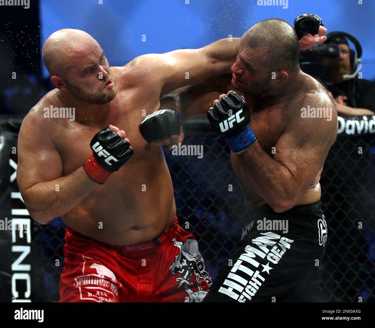 England's Mostapha Al Turk, right, fights with USA's Jon Madsen, left ...