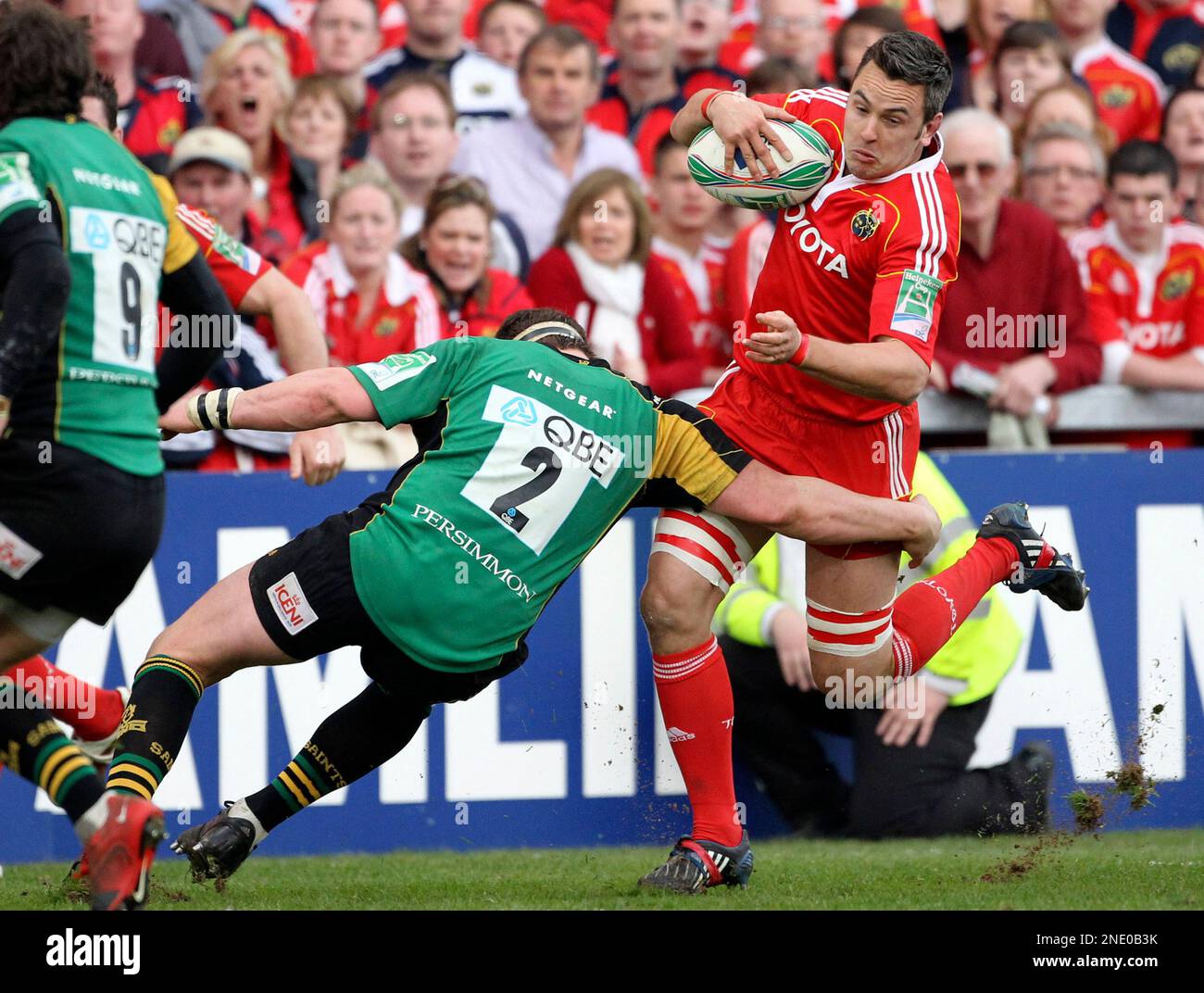 Munster's Niall, Ronan, right, tries to get past Northampton Saints ...