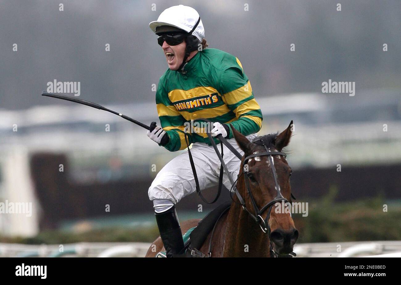 Jockey Tony McCoy reacts as he crosses finish line on Don't Push It to ...