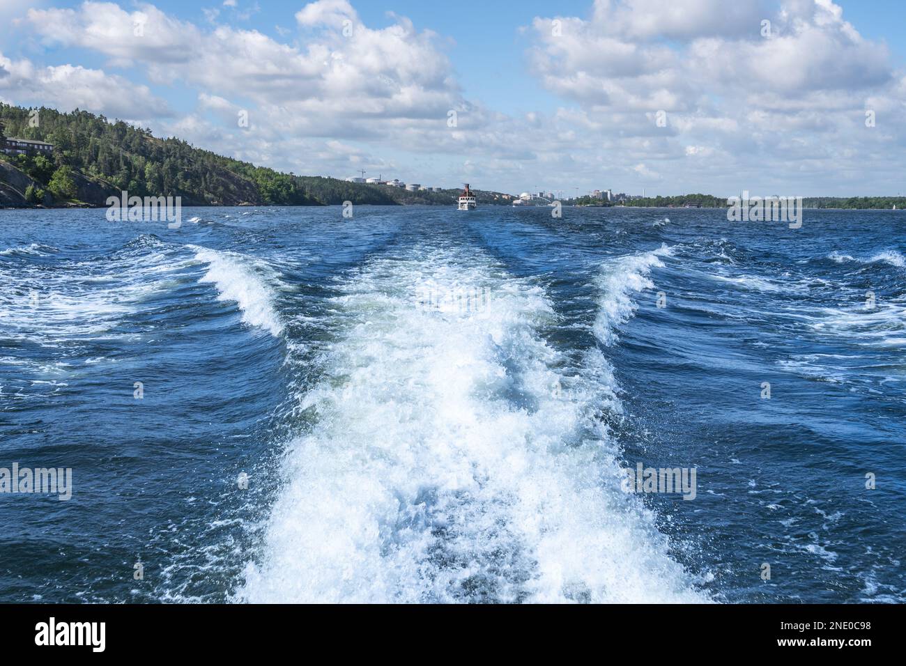 Rough water behind the boat. Seacruise in Sweden on a sunny and clear ...