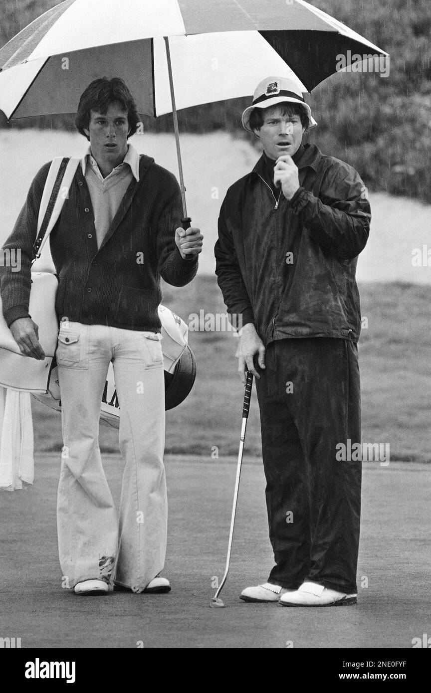 Defending champion Tom Watson, right, and his caddy Bruce Edwards ...