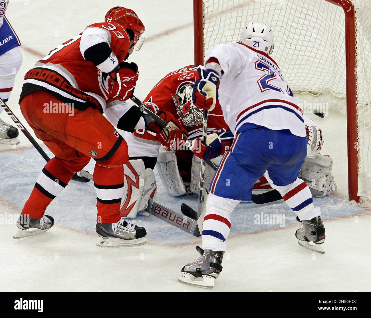 Montreal Canadiens' Brian Gionta, right, scores on Carolina Hurricanes ...