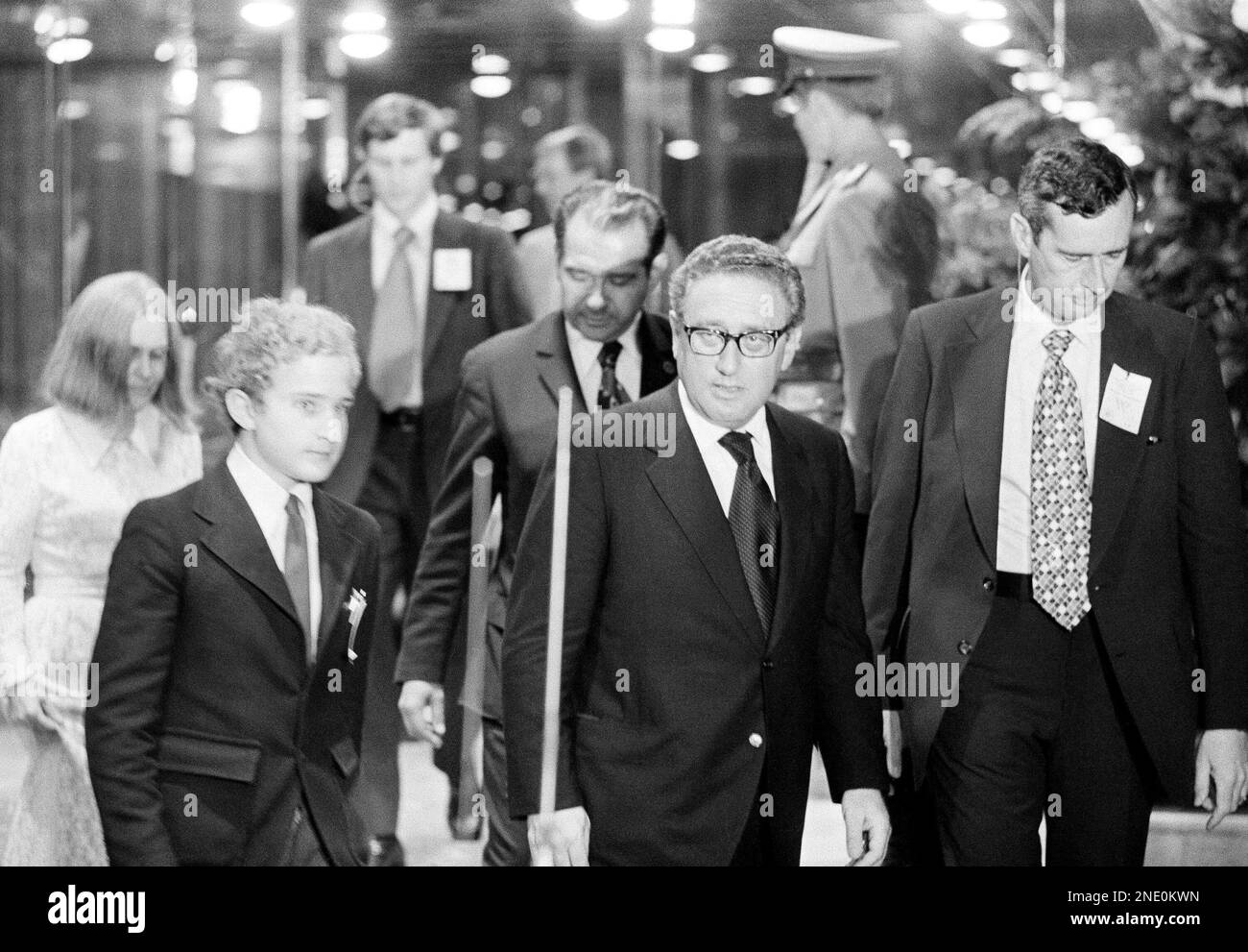 Secretary of State Henry Kissinger with his son David after attending a ...