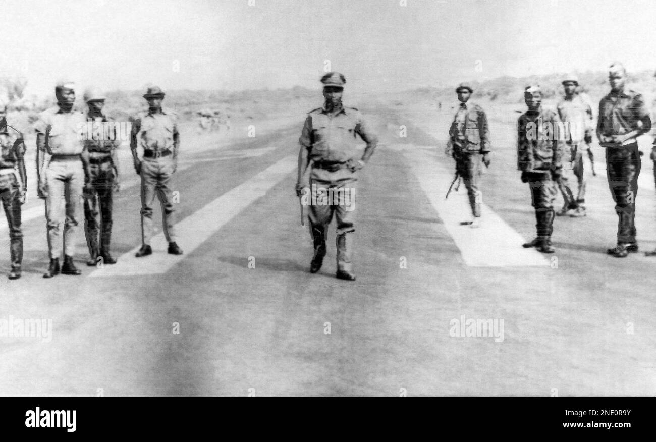 Col. Olusegun Obasanjo, center, who accepted the field surrender of ...