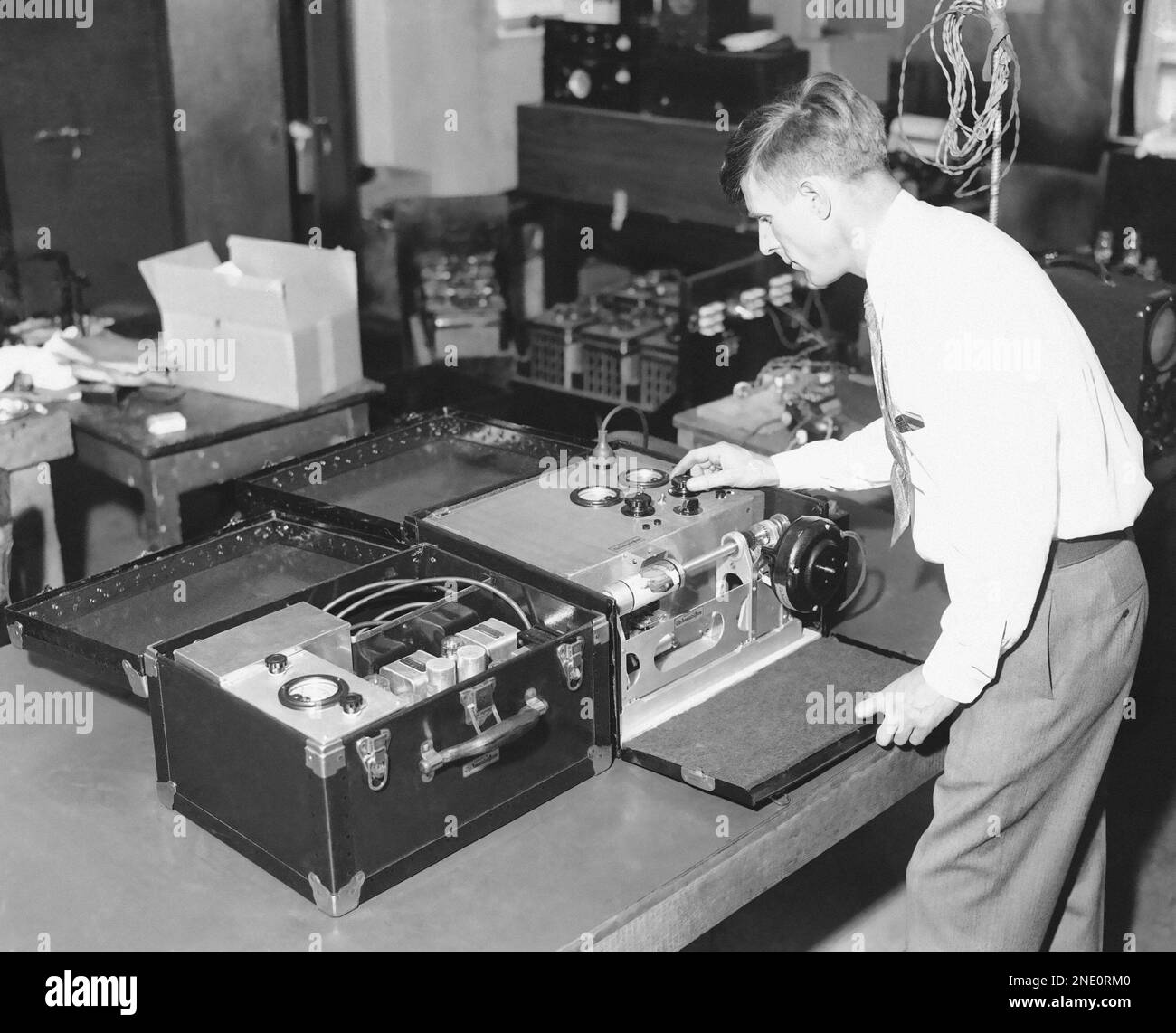 An unidentified AP staffer works on a portable WirePhoto machine, 1936 ...