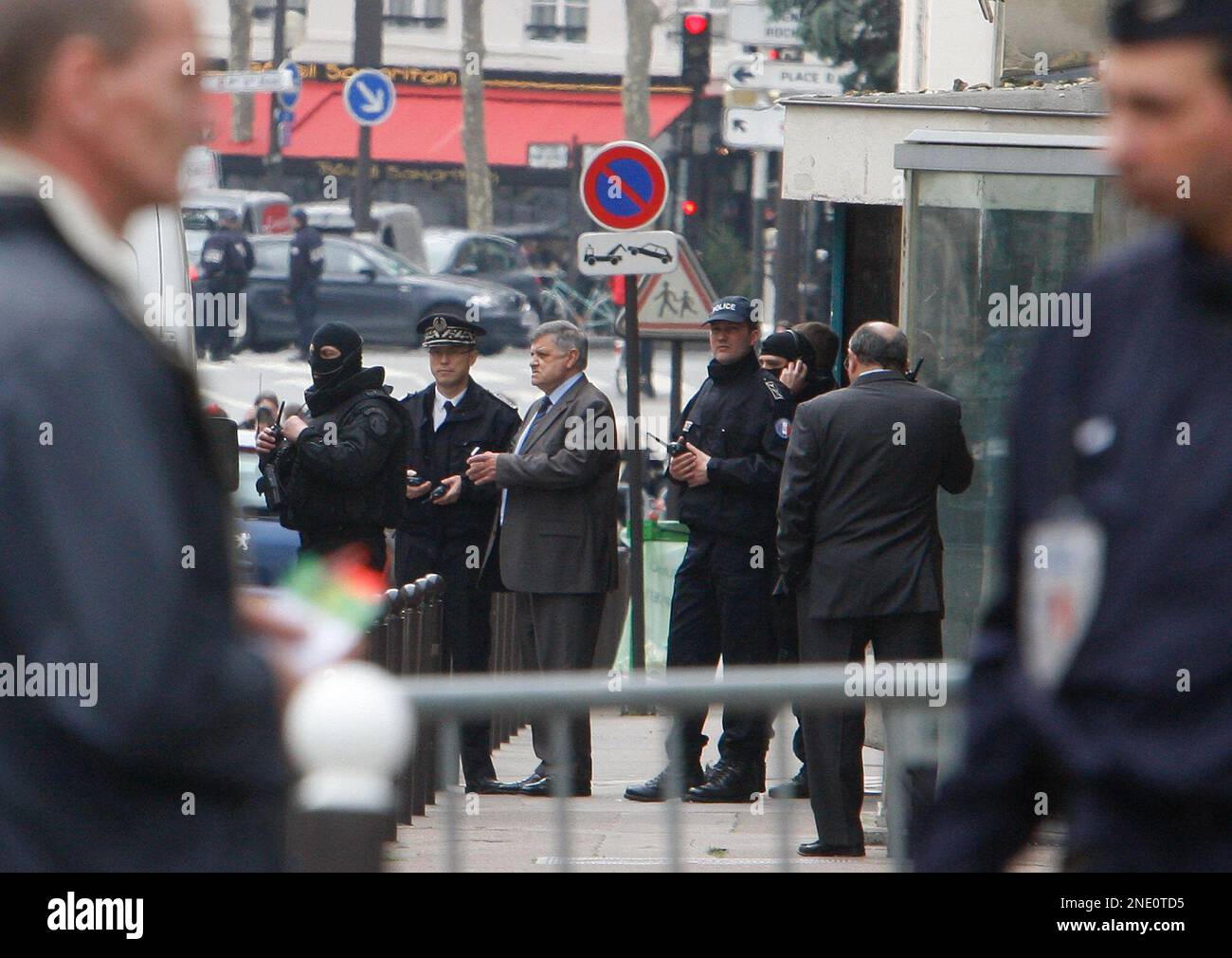 French police officers stand outside the Sante prison, where a prisoner ...