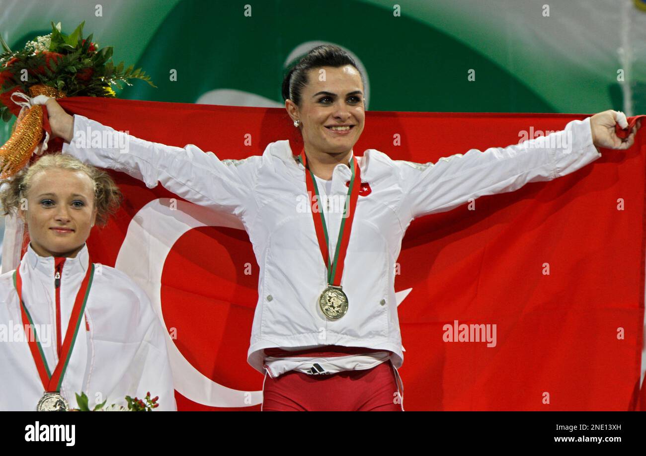 Turkey's Nurcan Taylan celebrates her gold medal in the Women's 48kg ...