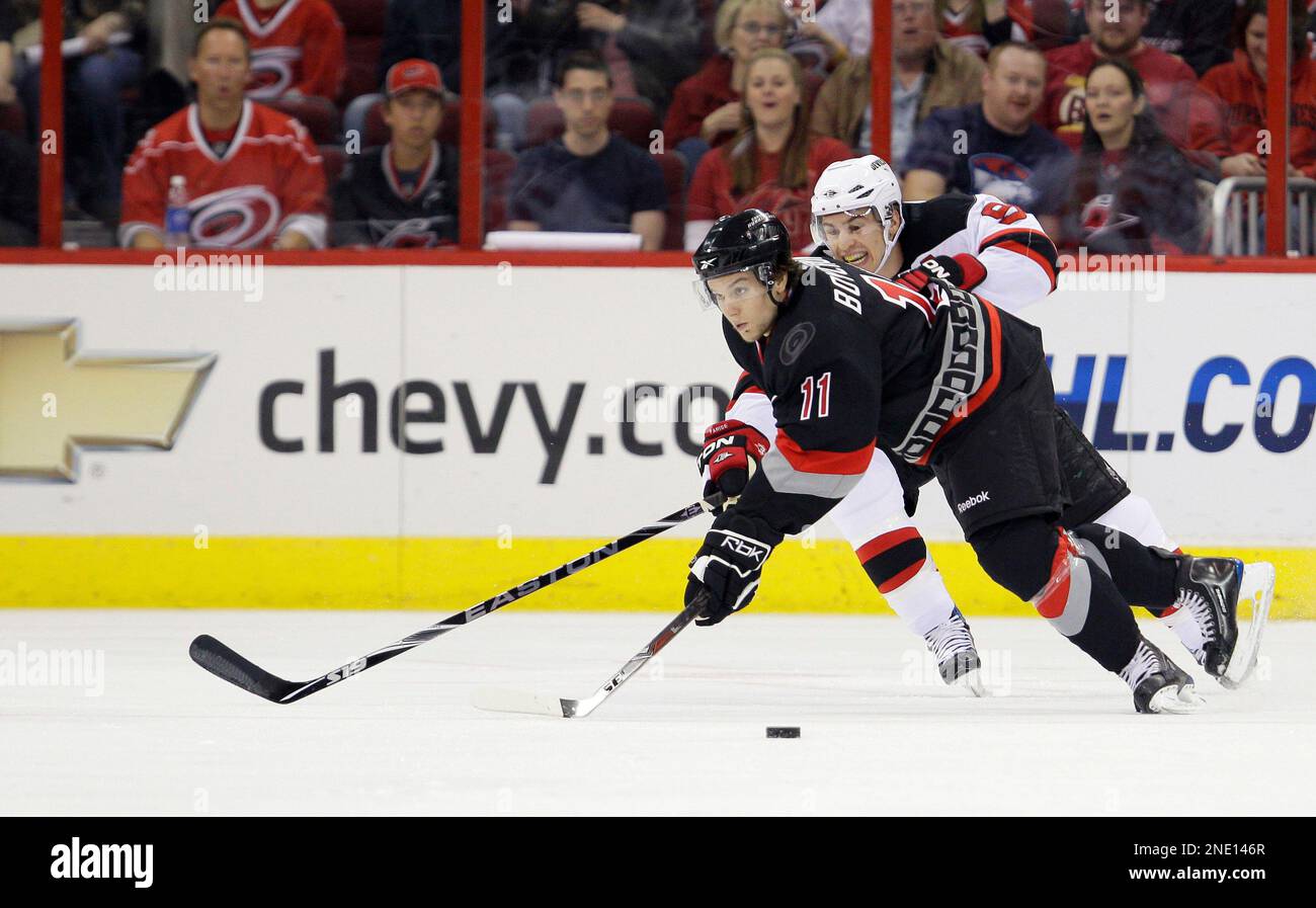 Carolina Hurricanes' Zach Boychuk (11) and New Jersey Devils' Zach ...
